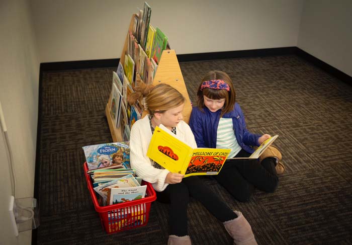 Literature stand honoring retired educator added at DHS building | La ...